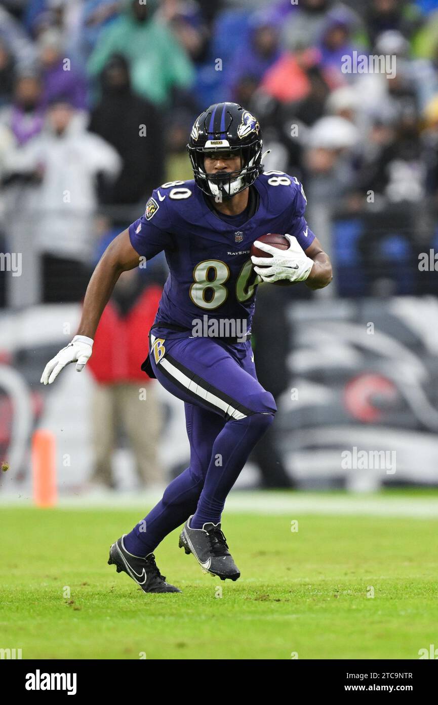 Baltimore Ravens tight end Isaiah Likely (80) runs with the ball after ...