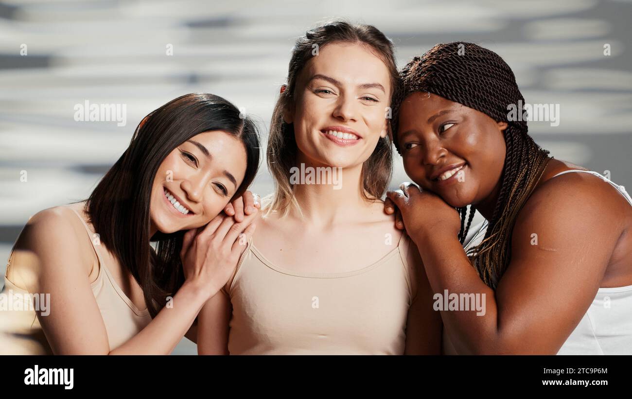 Group of confident girls promoting body acceptance on camera, laughing ...