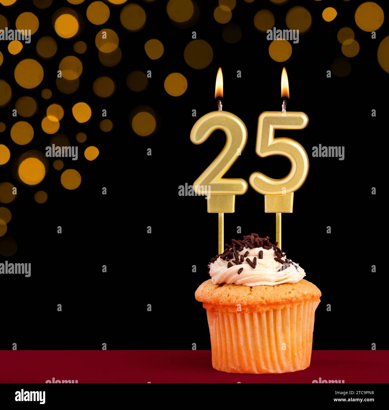 Number 25 birthday candle - Cupcake on black background with out of ...