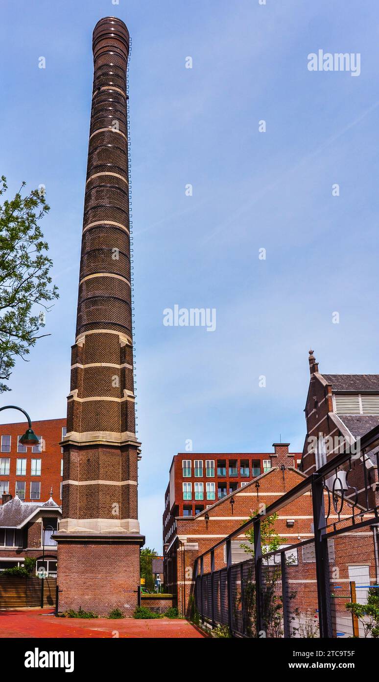 Urban view of a very well preserved old industrial chimney Stock Photo ...