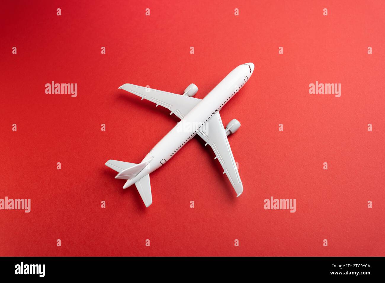 White plane on a red background. Airline operators, air carriers ...