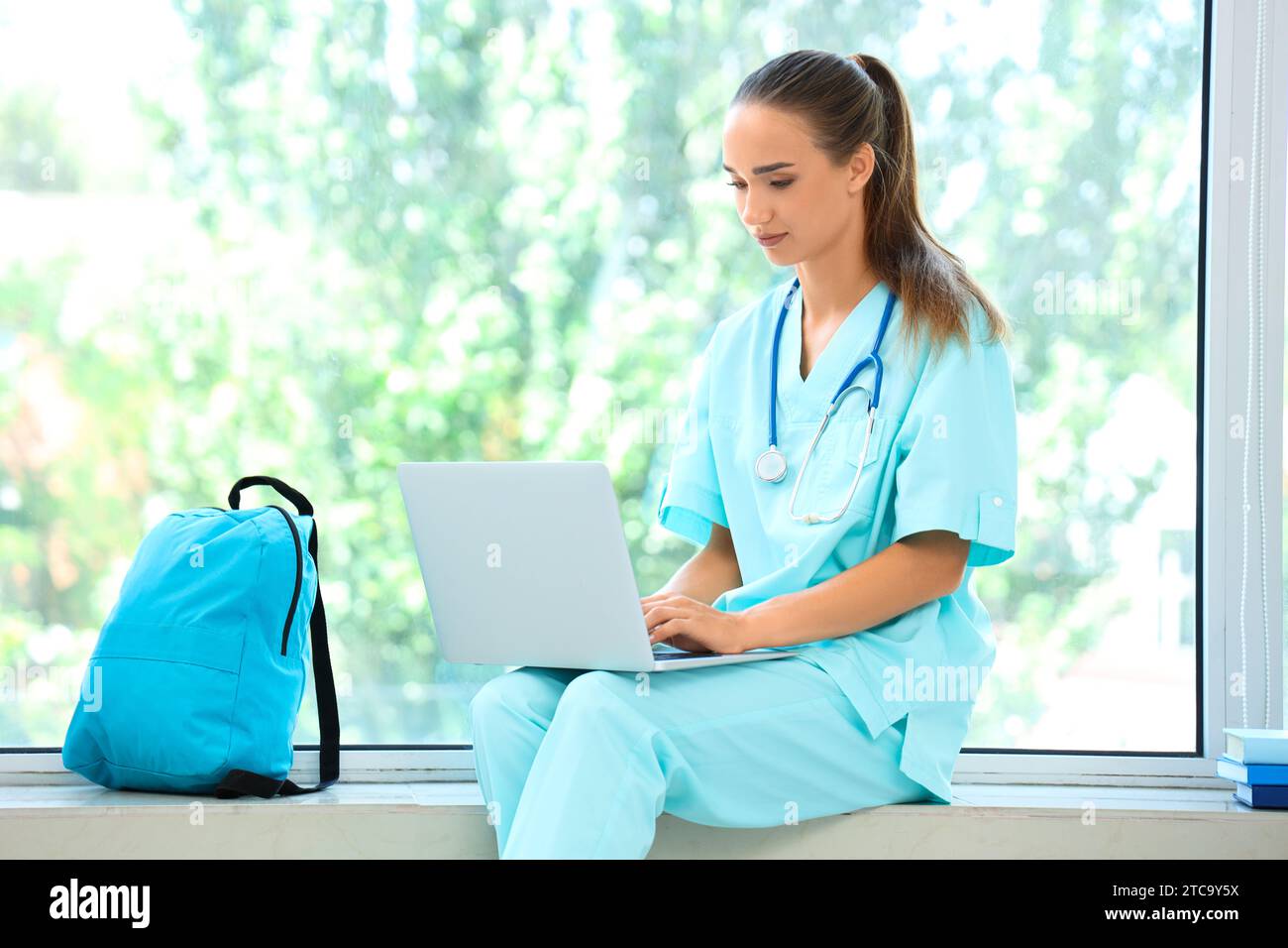 Student nurse computer studying uniform hi-res stock photography and ...
