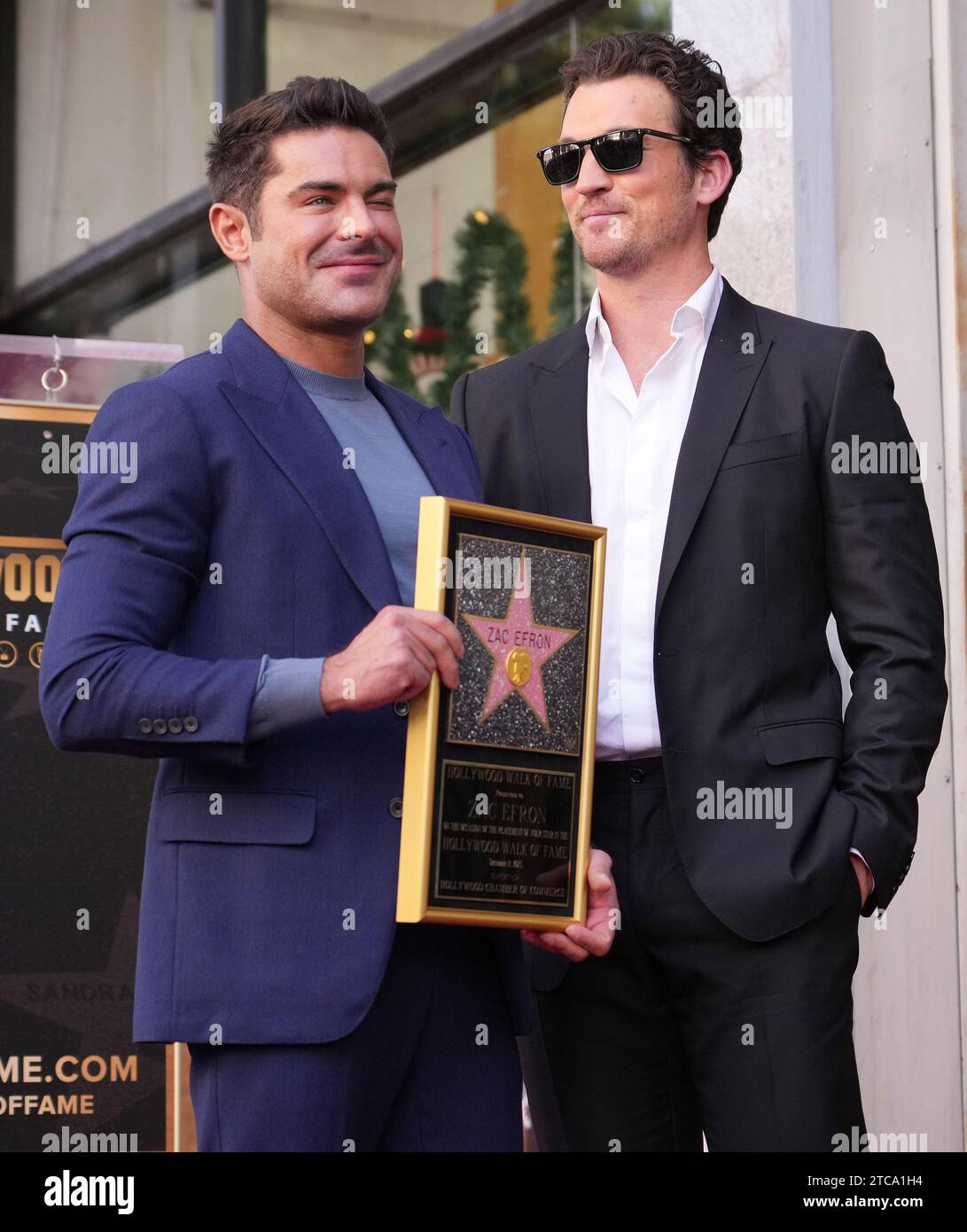 Los Angeles, USA. 11th Dec, 2023. (L-R) Zac Efron and Miles Teller at ...