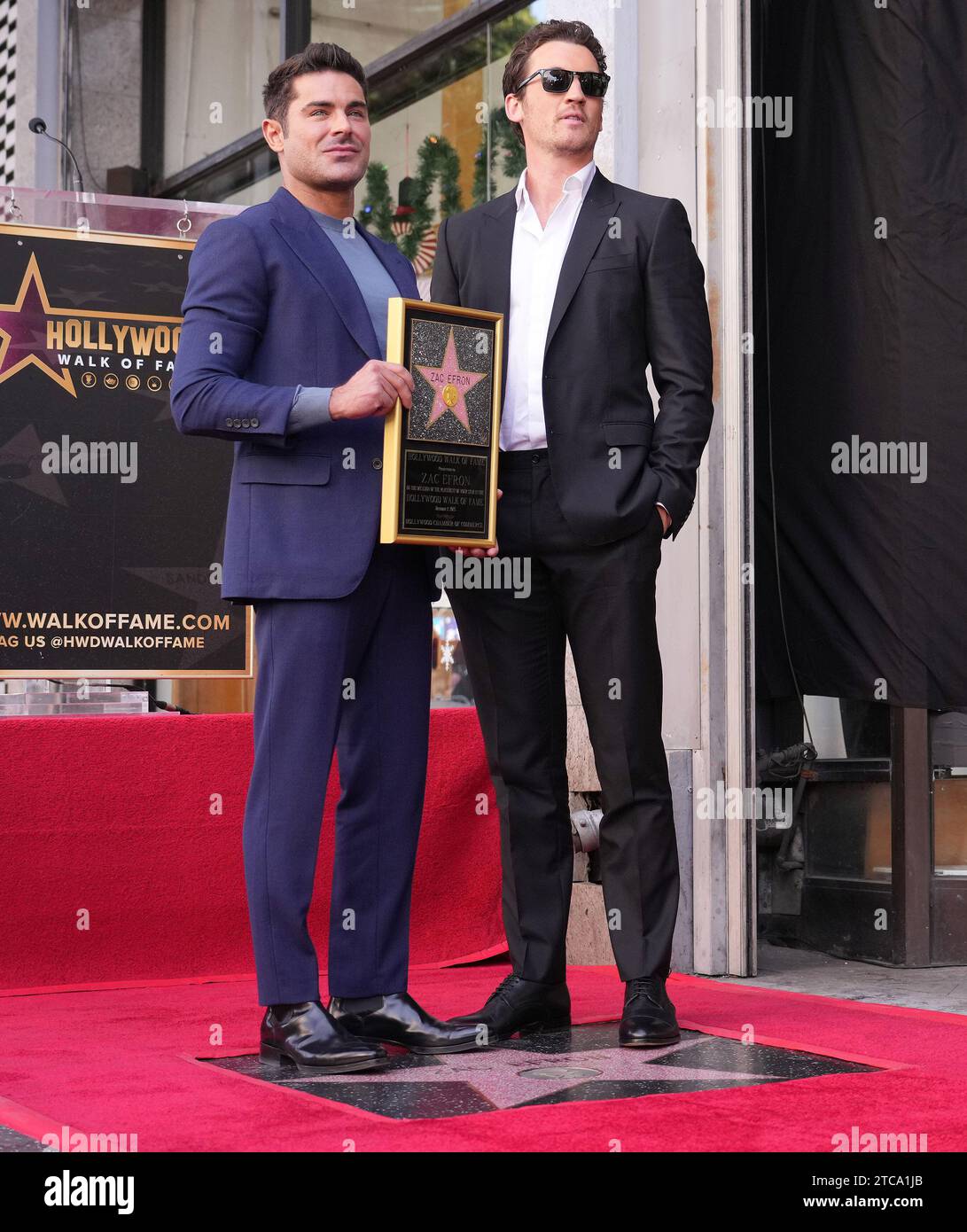 Los Angeles, USA. 11th Dec, 2023. (L-R) Zac Efron and Miles Teller at ...
