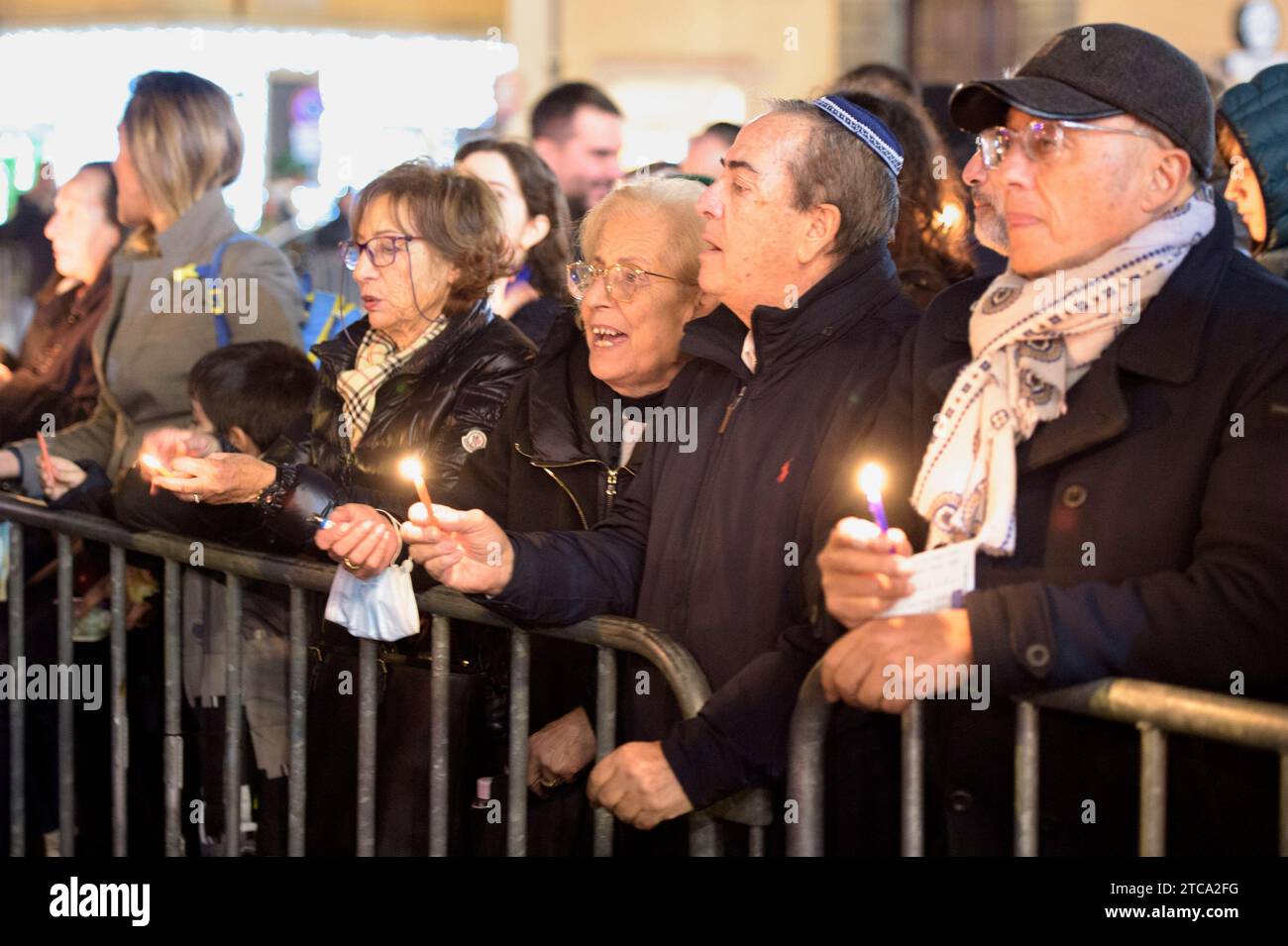 Rome, Italy. 10th Dec, 2023. People sing traditional songs and hold lit ...
