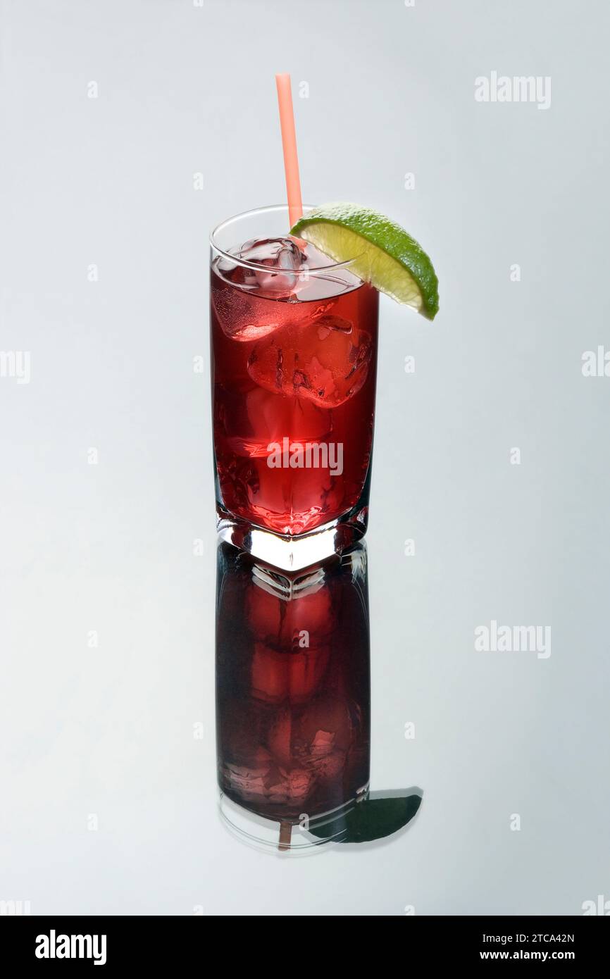 Cape Codder mixed drink on a grey background with reflection Stock ...