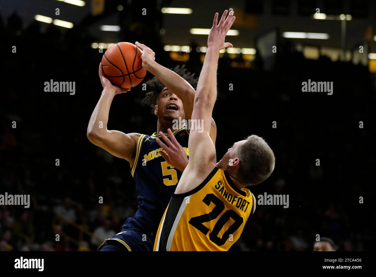 Michigan forward Terrance Williams II (5) shoots over Iowa forward ...