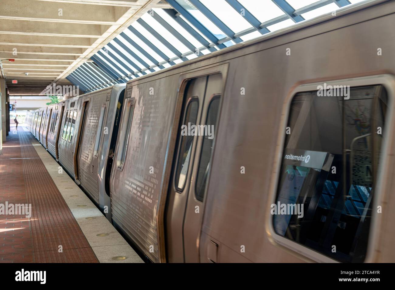 Metro train stopped in the West Falls Church station on the DC Orange ...