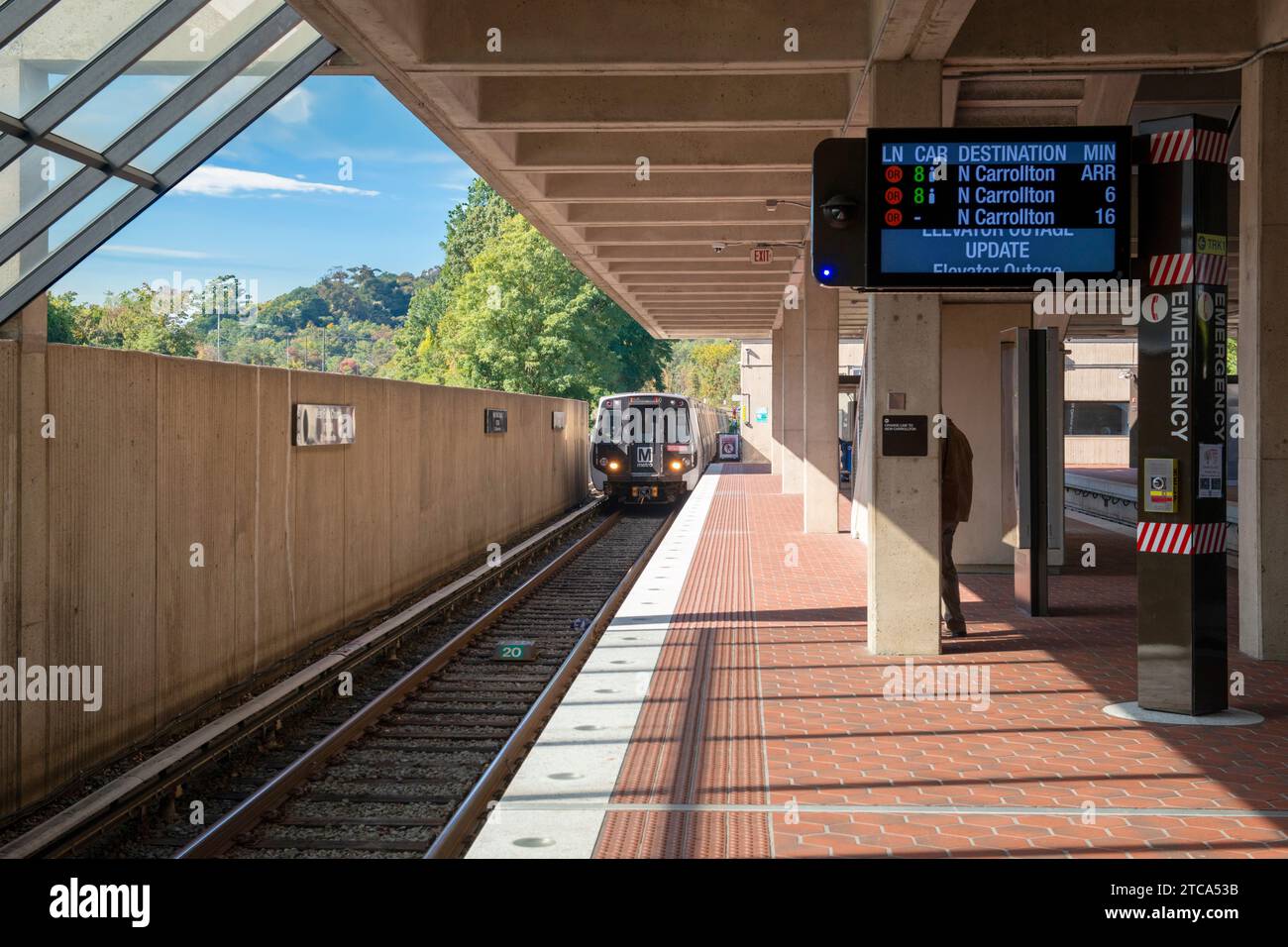 Metro train entering the West Falls Church station on the DC Orange ...