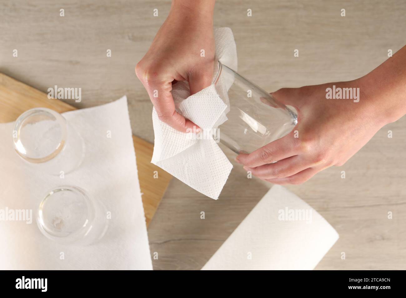 Woman cleaning glass table hi-res stock photography and images - Alamy