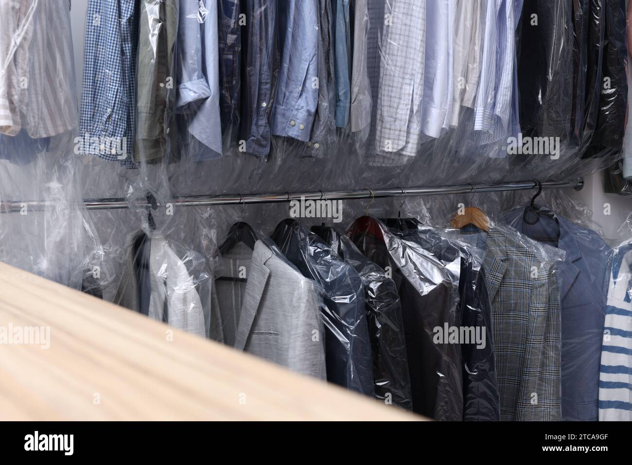 Various clothes on hangers hi-res stock photography and images - Alamy