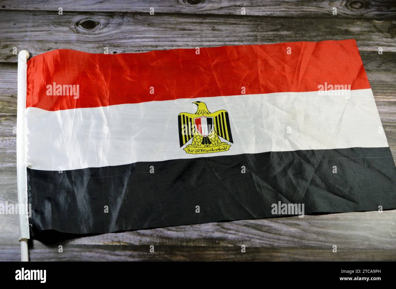 The national flag of Egypt, a tricolour consisting of the three equal ...
