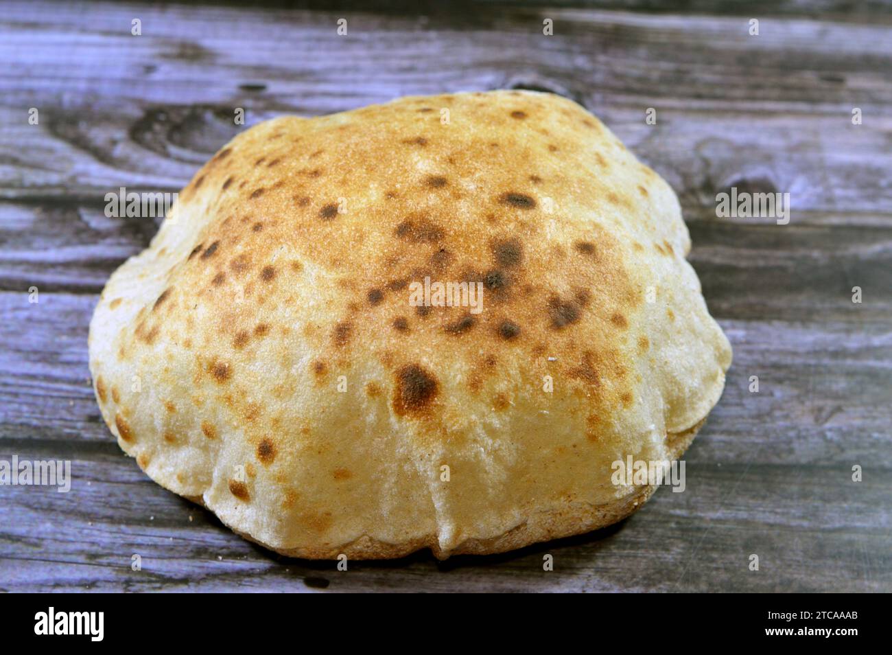 Traditional Egyptian flat bread with wheat bran and flour, regular Aish ...