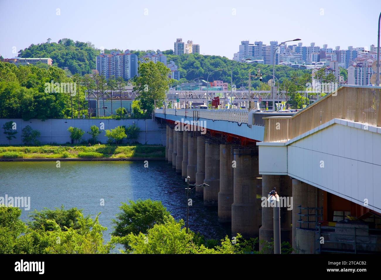 Focusing on the robust support pillars of Hangang Bridge, this view ...