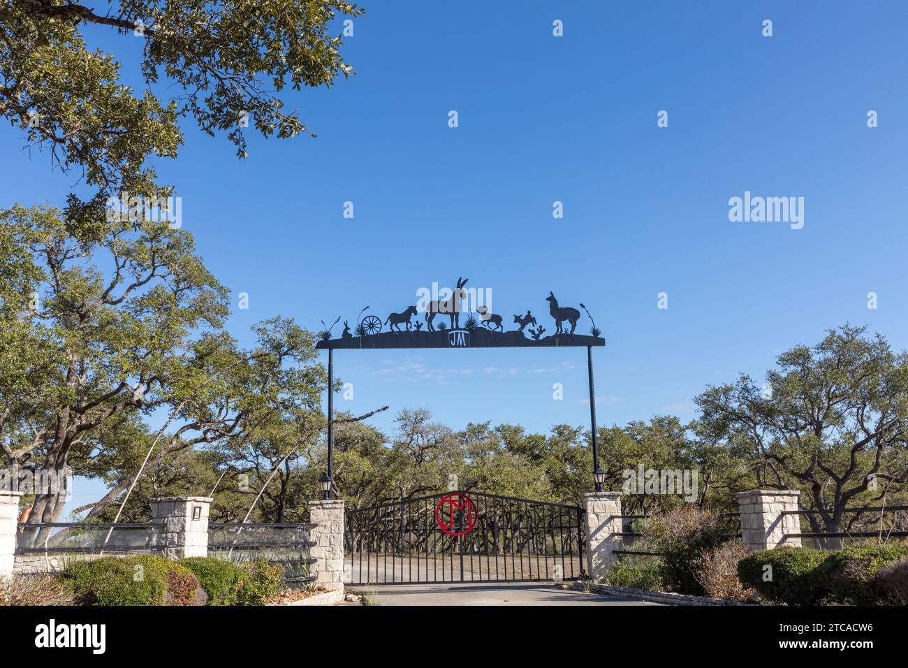 Blanco, Texas - November 2, 2023: iron entrance gate with animal ...