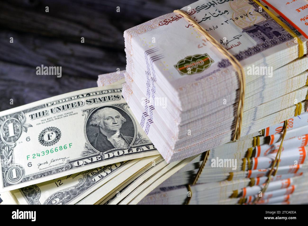 Two stacks of dollar bills hi-res stock photography and images - Alamy