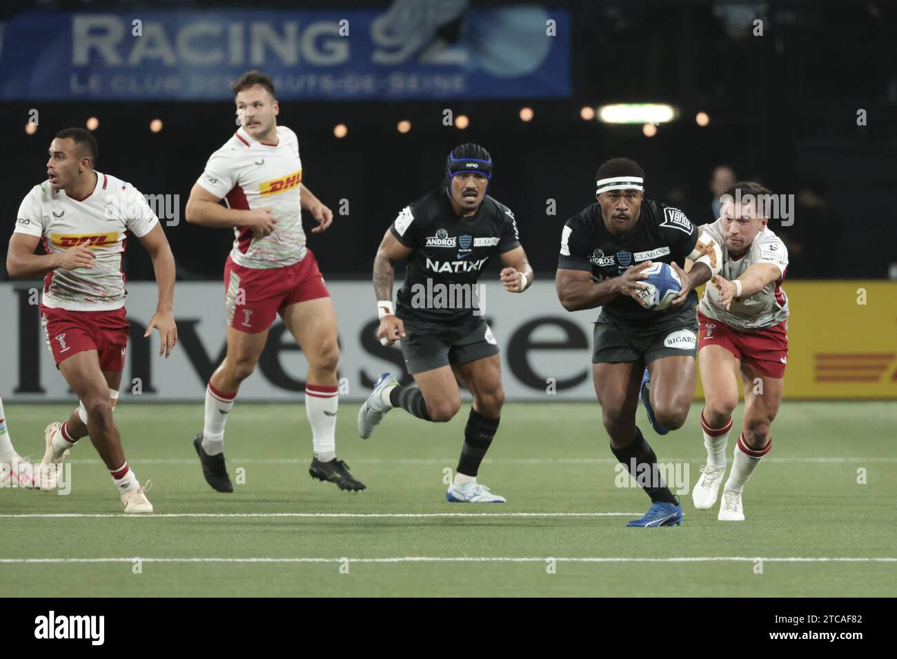Vinaya Habosi of Racing 92, Nick David of Harlequins during the EPCR ...