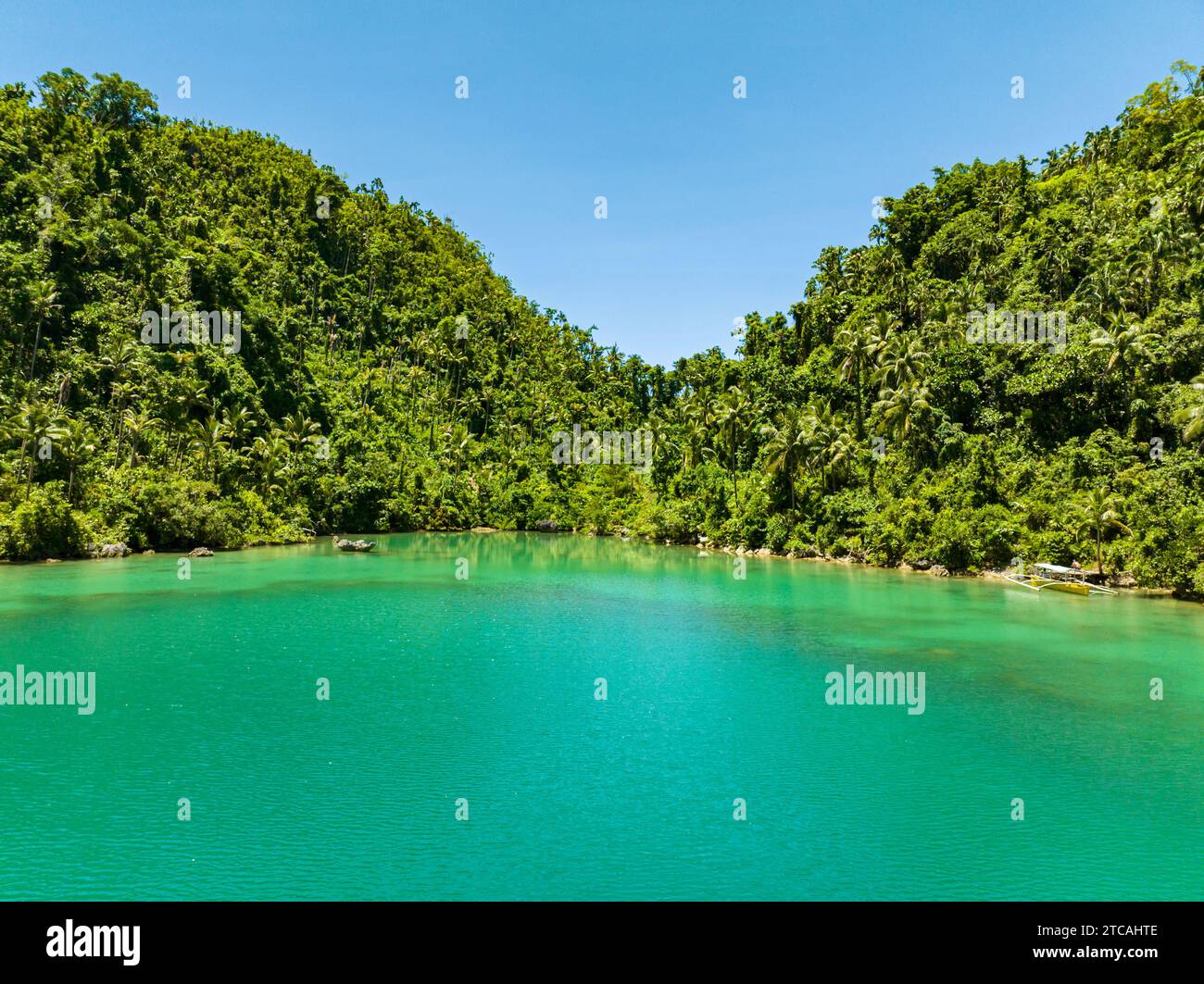 Aerial forward over tropical island hi-res stock photography and images ...