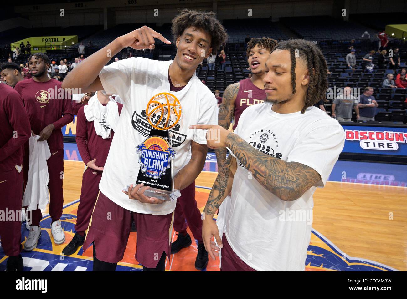Florida State forward Baba Miller, left, and guard Josh Nickelberry ...