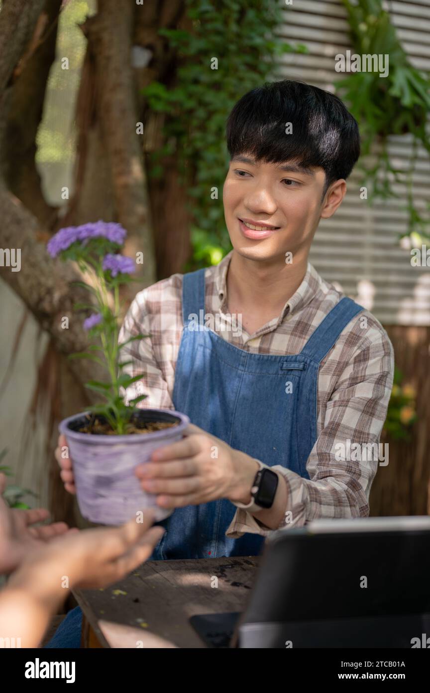 Male hand handing one flower hi-res stock photography and images - Alamy