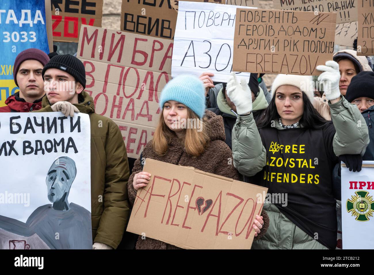 Families and relatives of POWs of the Azov regiment hold placards ...