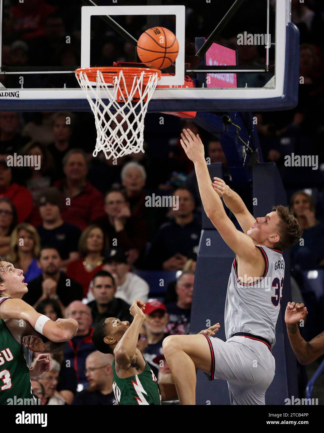 Gonzaga forward Ben Gregg (33) watches his shot go into the basket ...