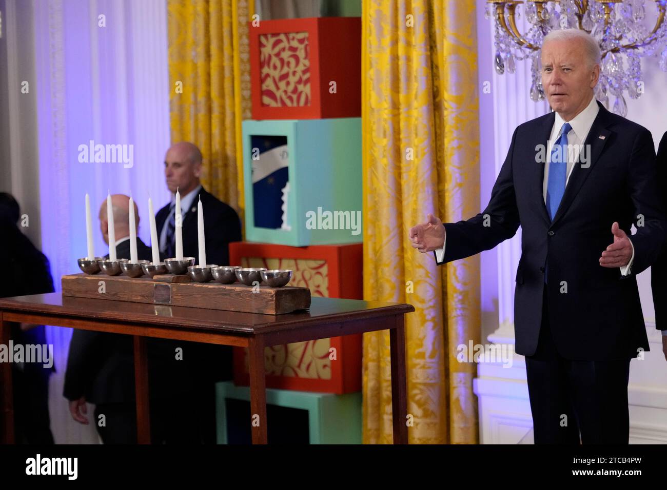 United States President Joe Biden arrives to speak at a Hanukkah ...