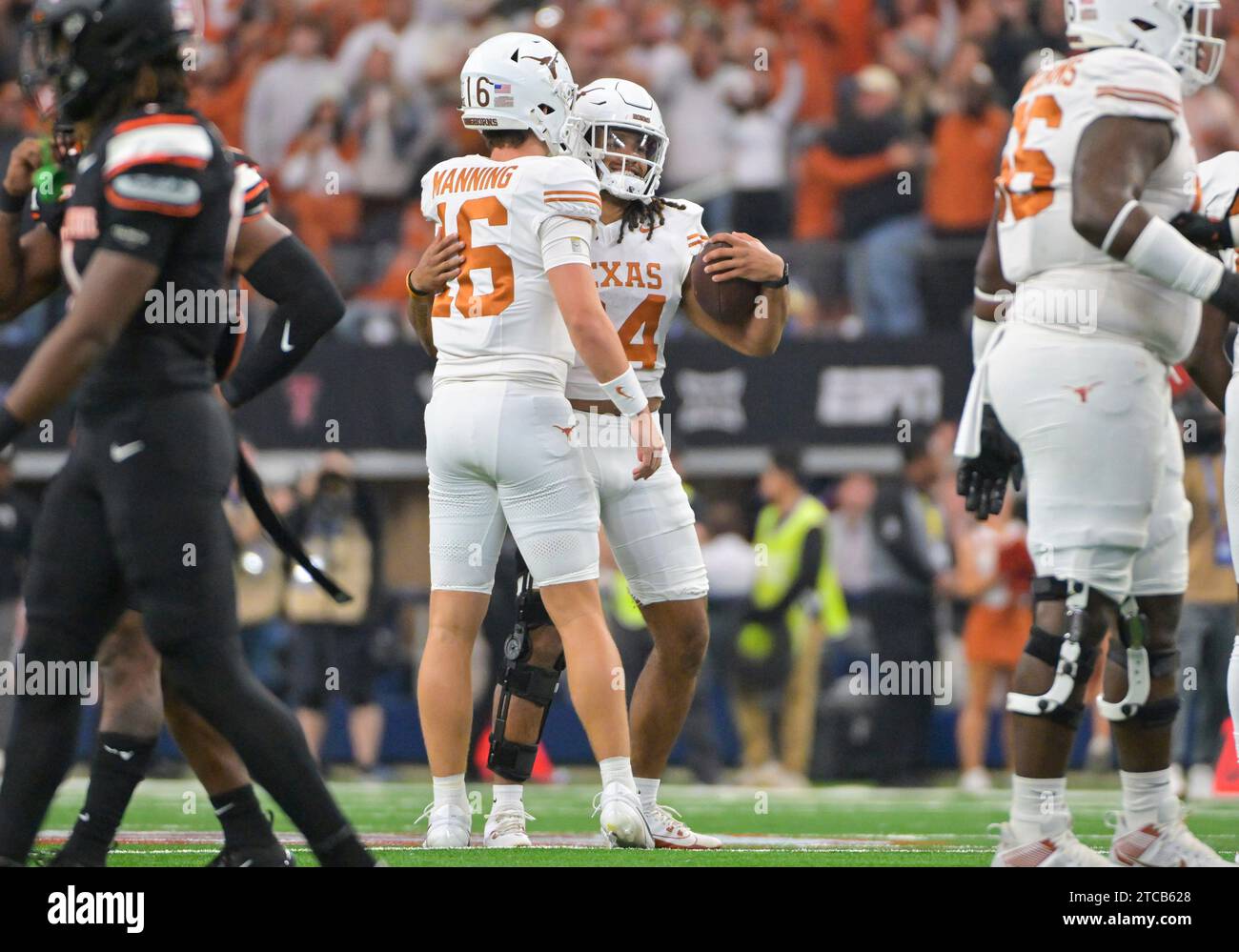 December 2 2023: Texas Longhorns running back Jonathon Brooks (24) hugs ...