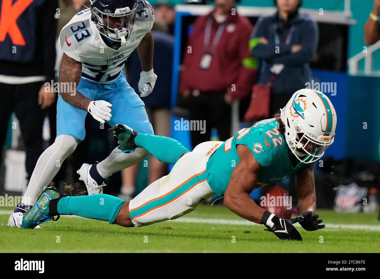 Miami Dolphins safety Elijah Campbell (22) recovers a fumble by ...