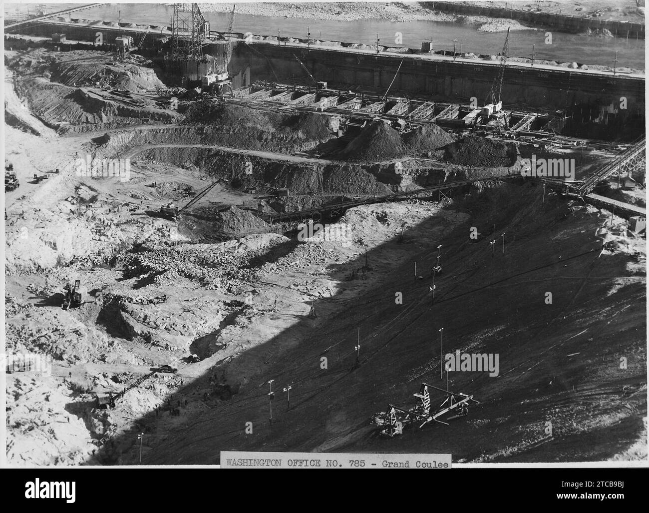 West side bedrock as seen from the west end of forebay slope. From left ...