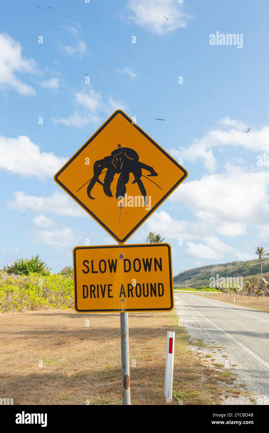 Slow Down road sign warning to drive around robber crabs, Christmas ...