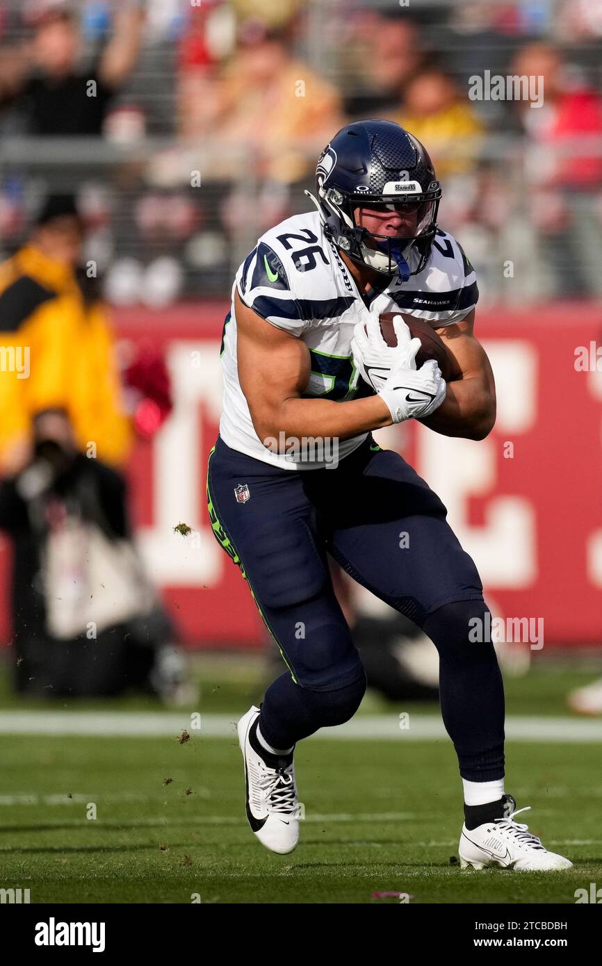 Seattle Seahawks running back Zach Charbonnet runs the ball against the ...