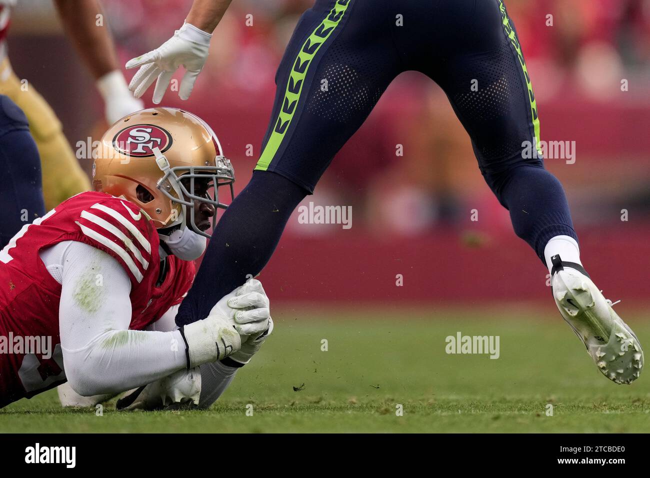 San Francisco 49ers defensive end Clelin Ferrell, left, tackles Seattle ...