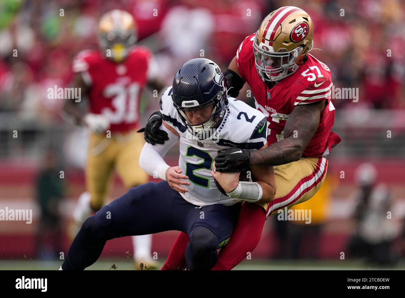 San Francisco 49ers linebacker Dre Greenlaw (57) tackles Seattle ...