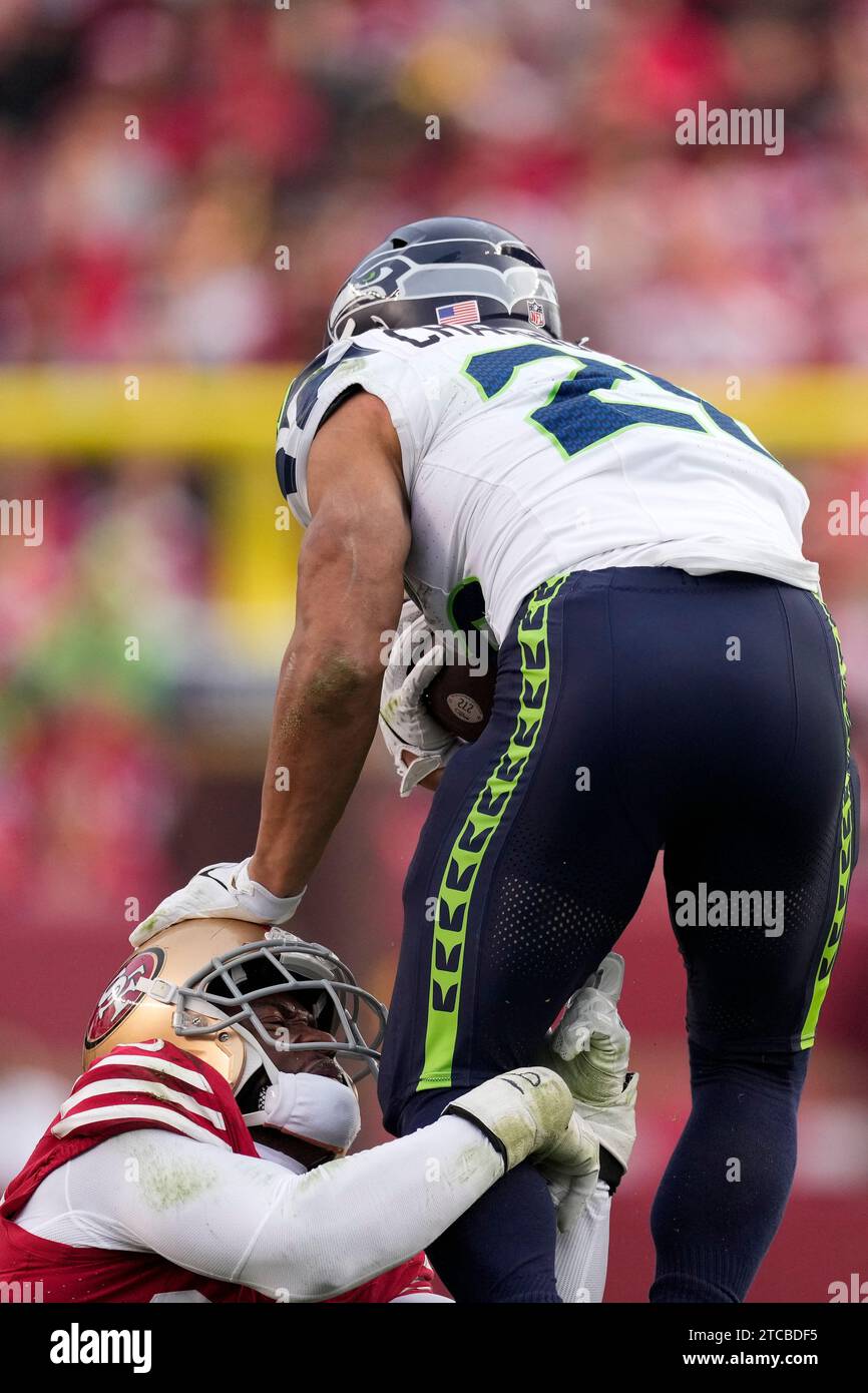San Francisco 49ers defensive end Clelin Ferrell, left, tackles Seattle ...