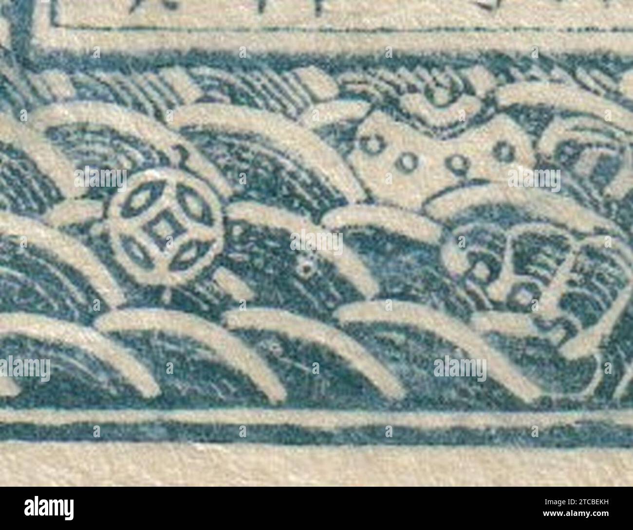 Wheel floating in the sea next to a bamboo rattle (representing good ...