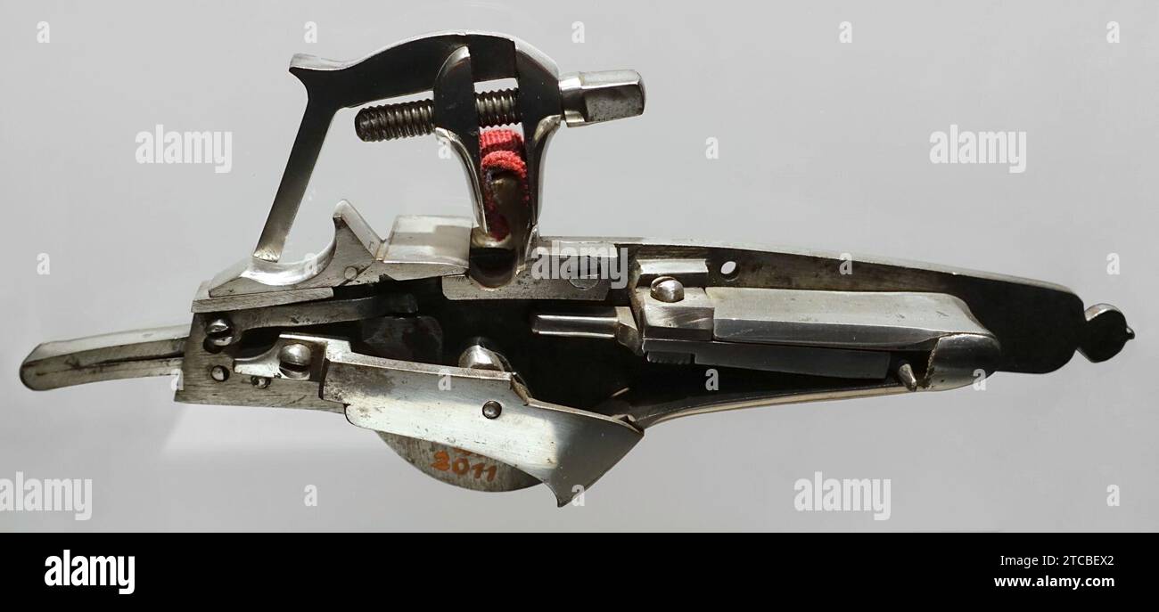 Wheellock for a firearm, 17th century, iron Stock Photo - Alamy