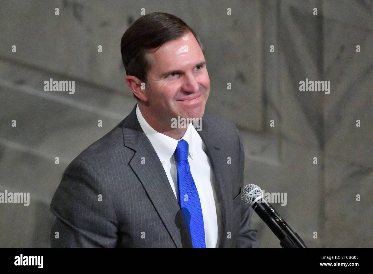 Kentucky Gov. Andy Beshear smiles as he addresses the audience gathered ...