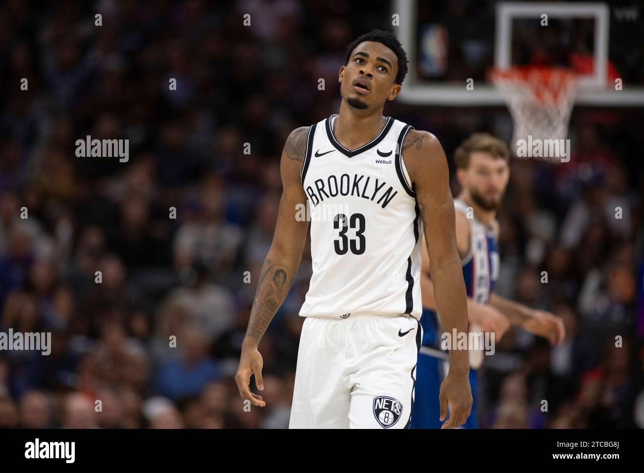 Brooklyn Nets center Nic Claxton (33) walks up the court late in the ...