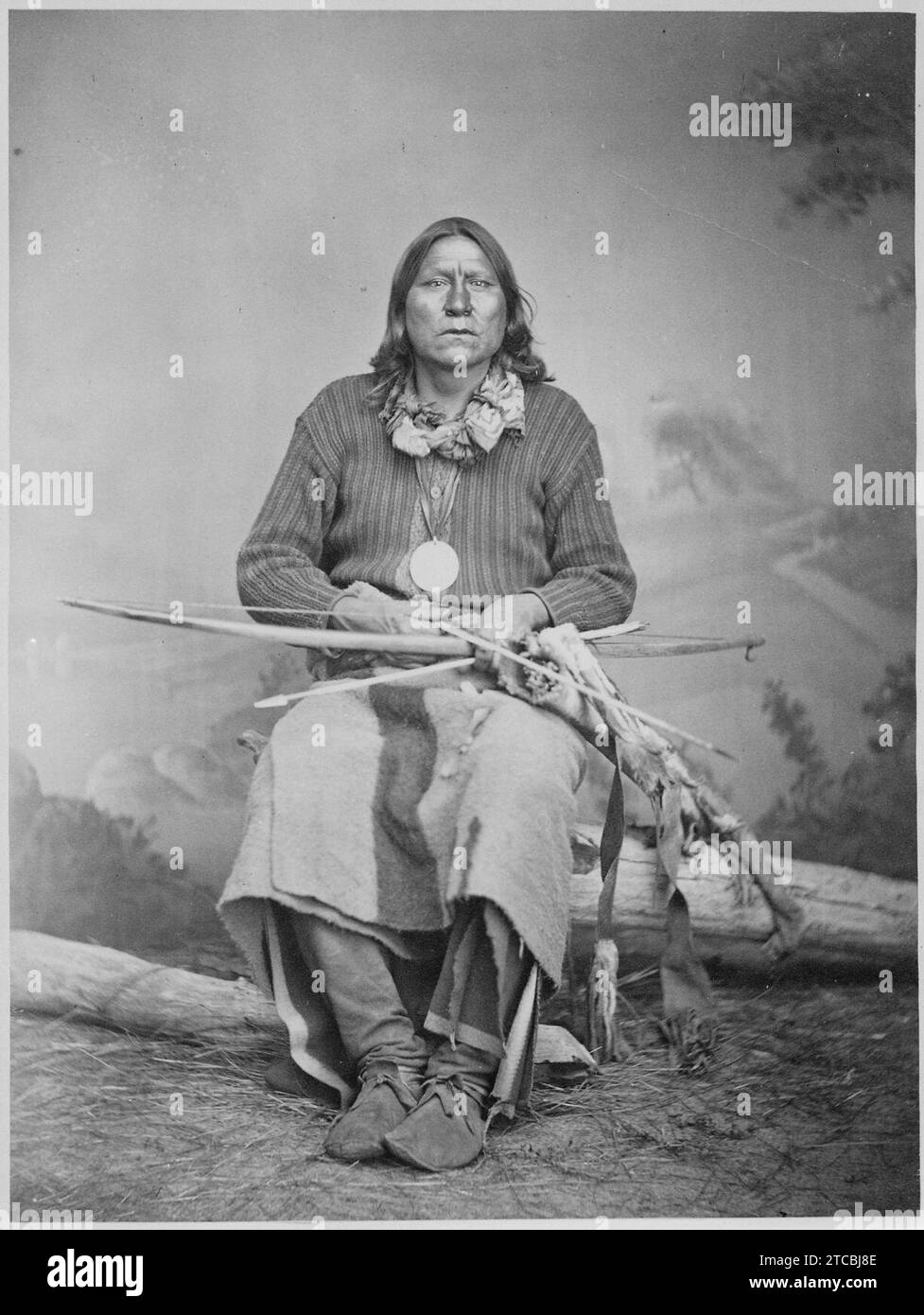 White Bear (Sa-tan-ta), a Kiowa chief, full-length, seated, holding bow ...