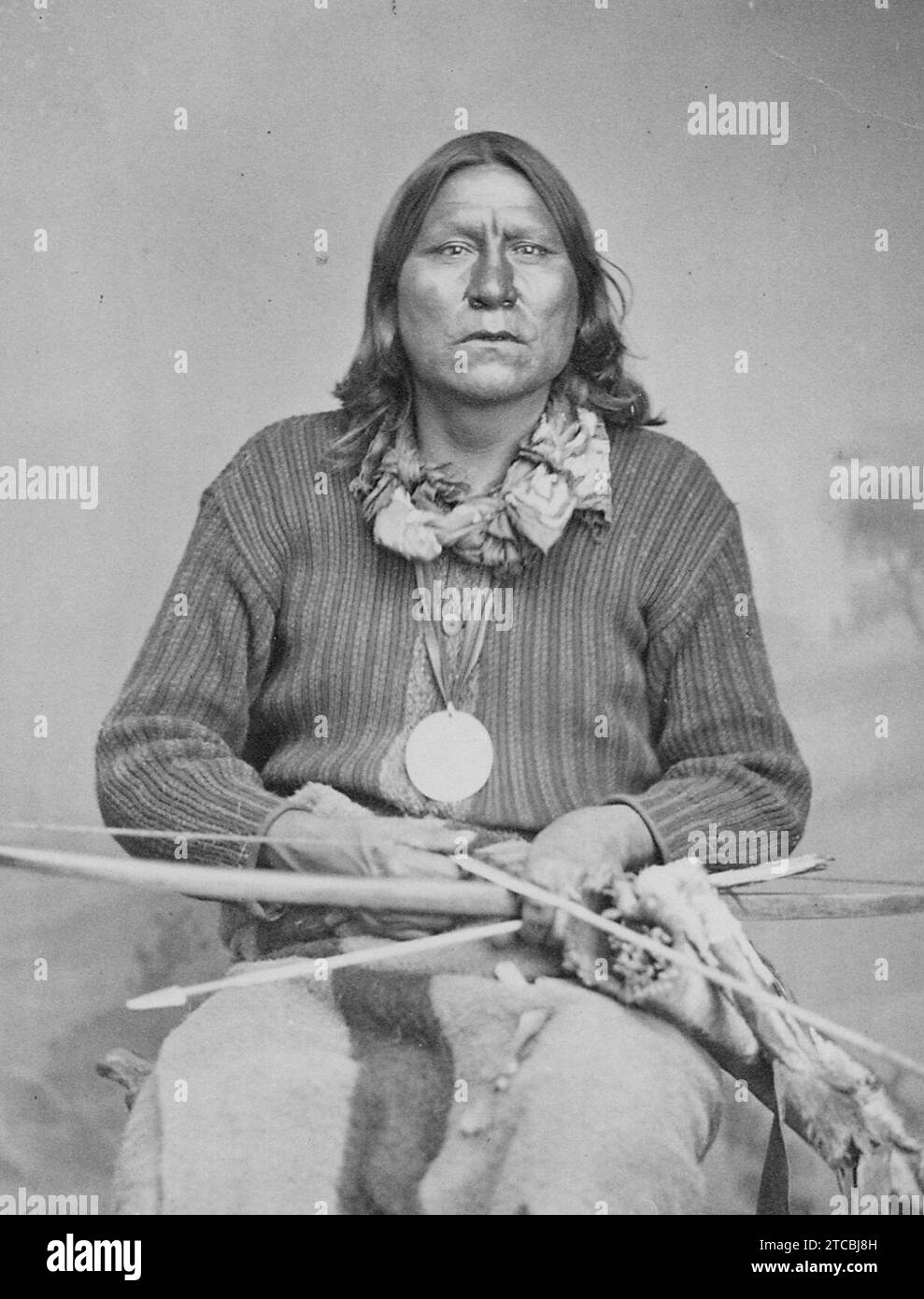 White Bear (Sa-tan-ta), a Kiowa chief, full-length, seated, holding bow ...