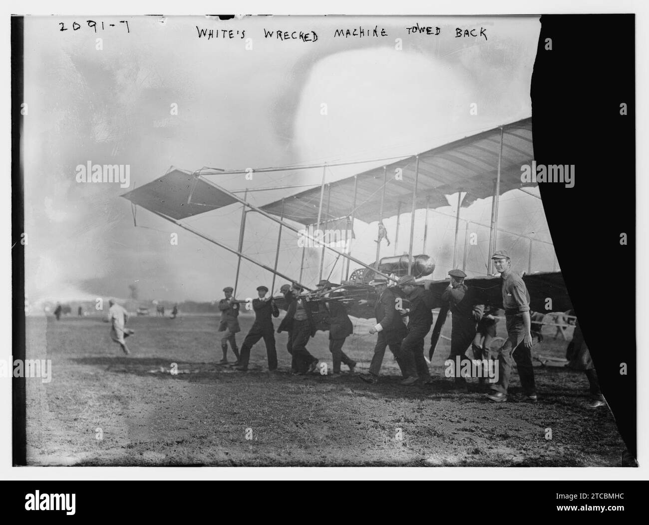 White's wrecked machine towed back Stock Photo - Alamy