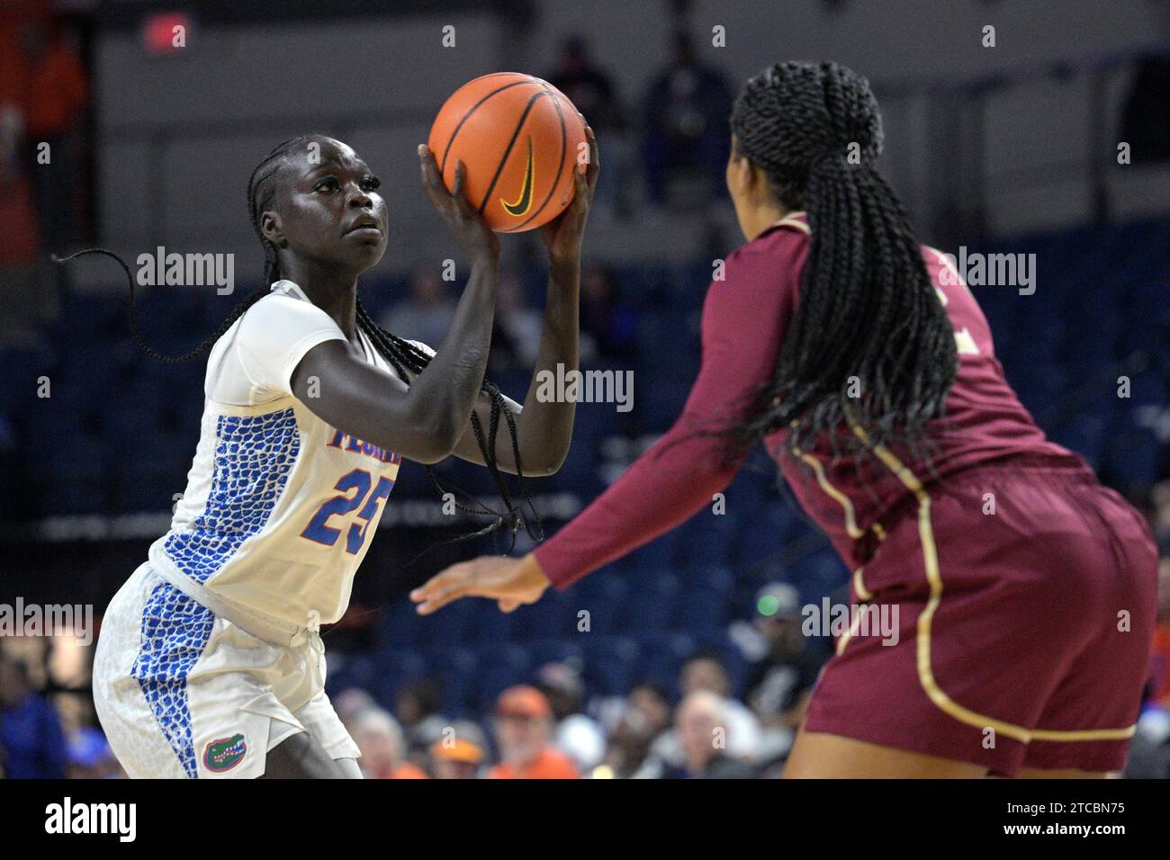 Florida forward Faith Dut (25) sets up for a shot in front of Florida ...