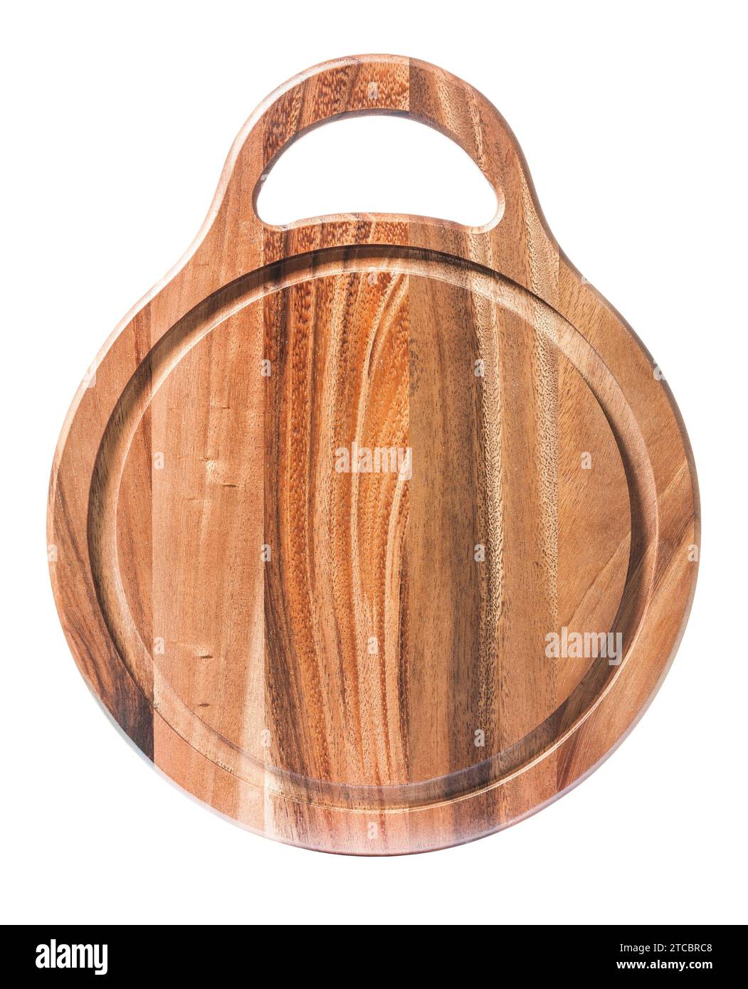 Dark round kitchen chopping board made of natural wood against a white ...