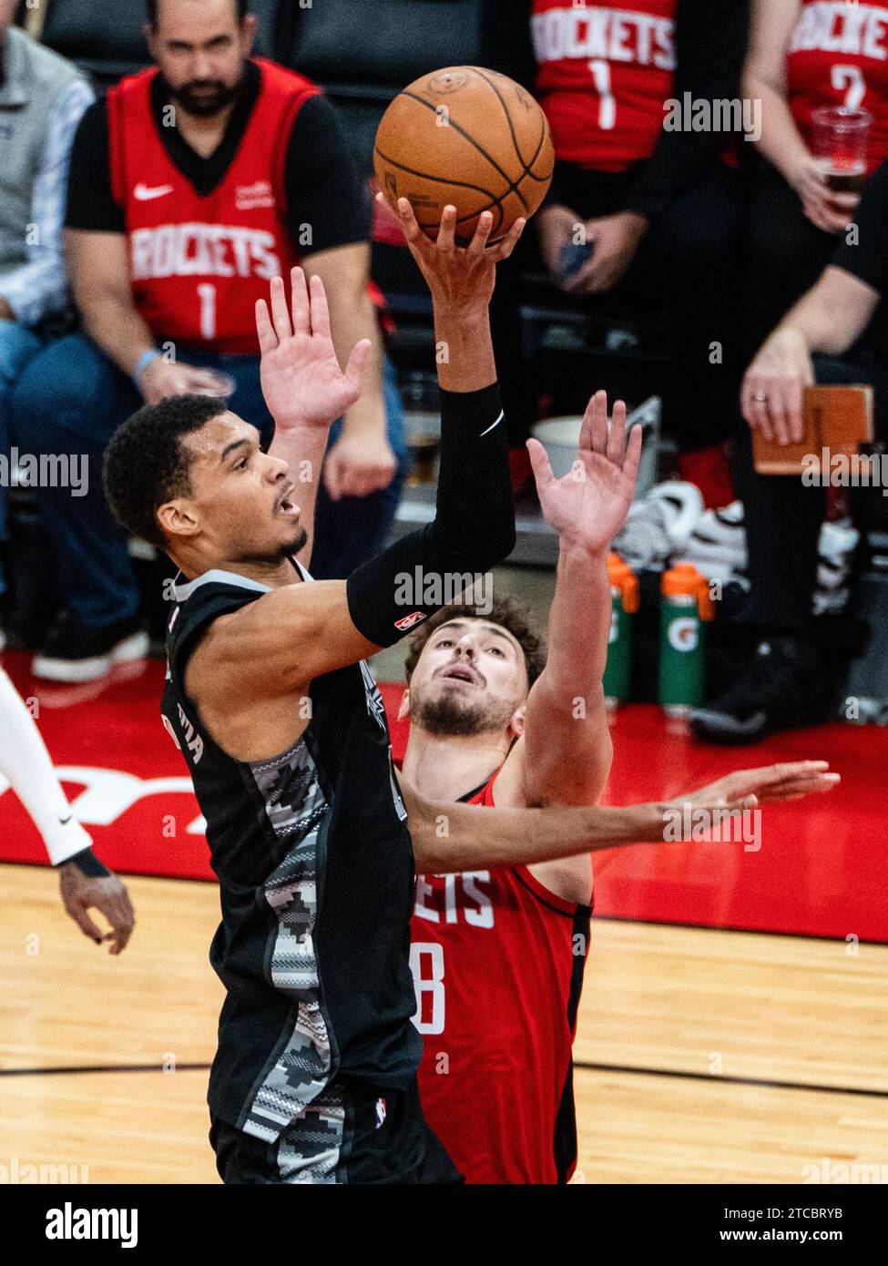Houston, USA. 11th Dec, 2023. Victor Wembanyama (L) of San Antonio ...
