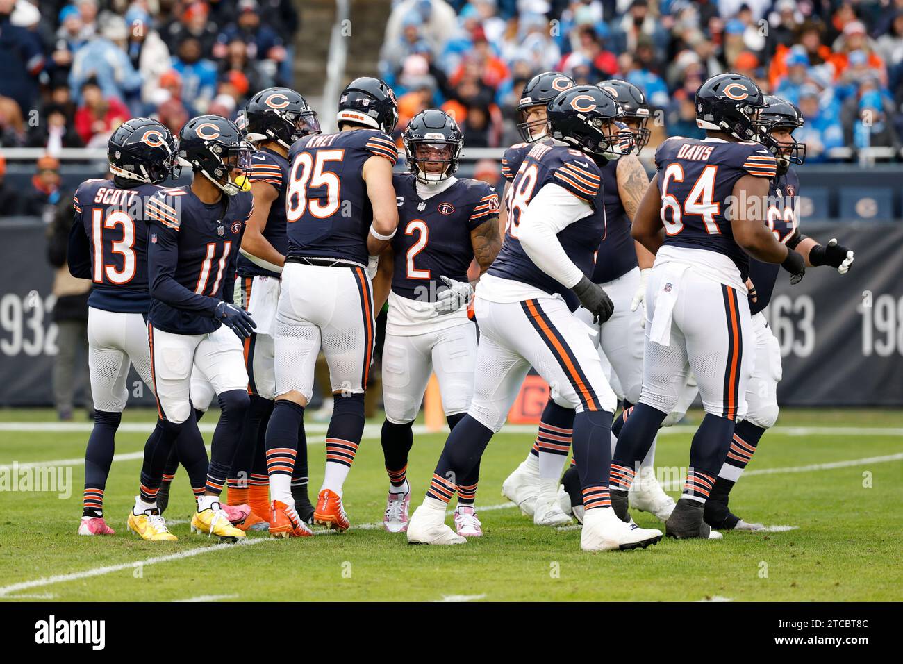 Chicago Bears wide receiver DJ Moore (2) and teammates walk on the ...