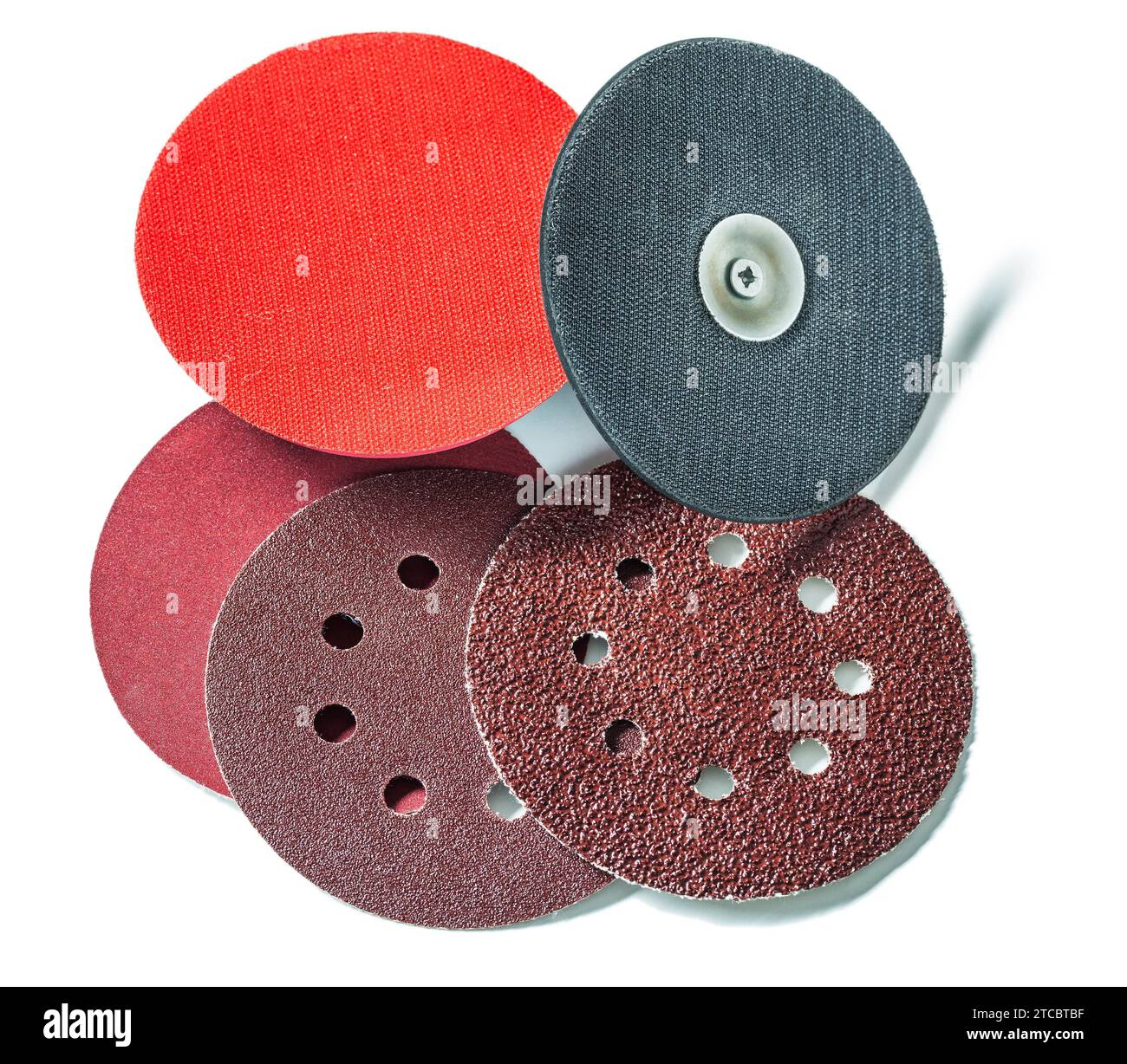 Grinding discs and holders against a white background Stock Photo - Alamy