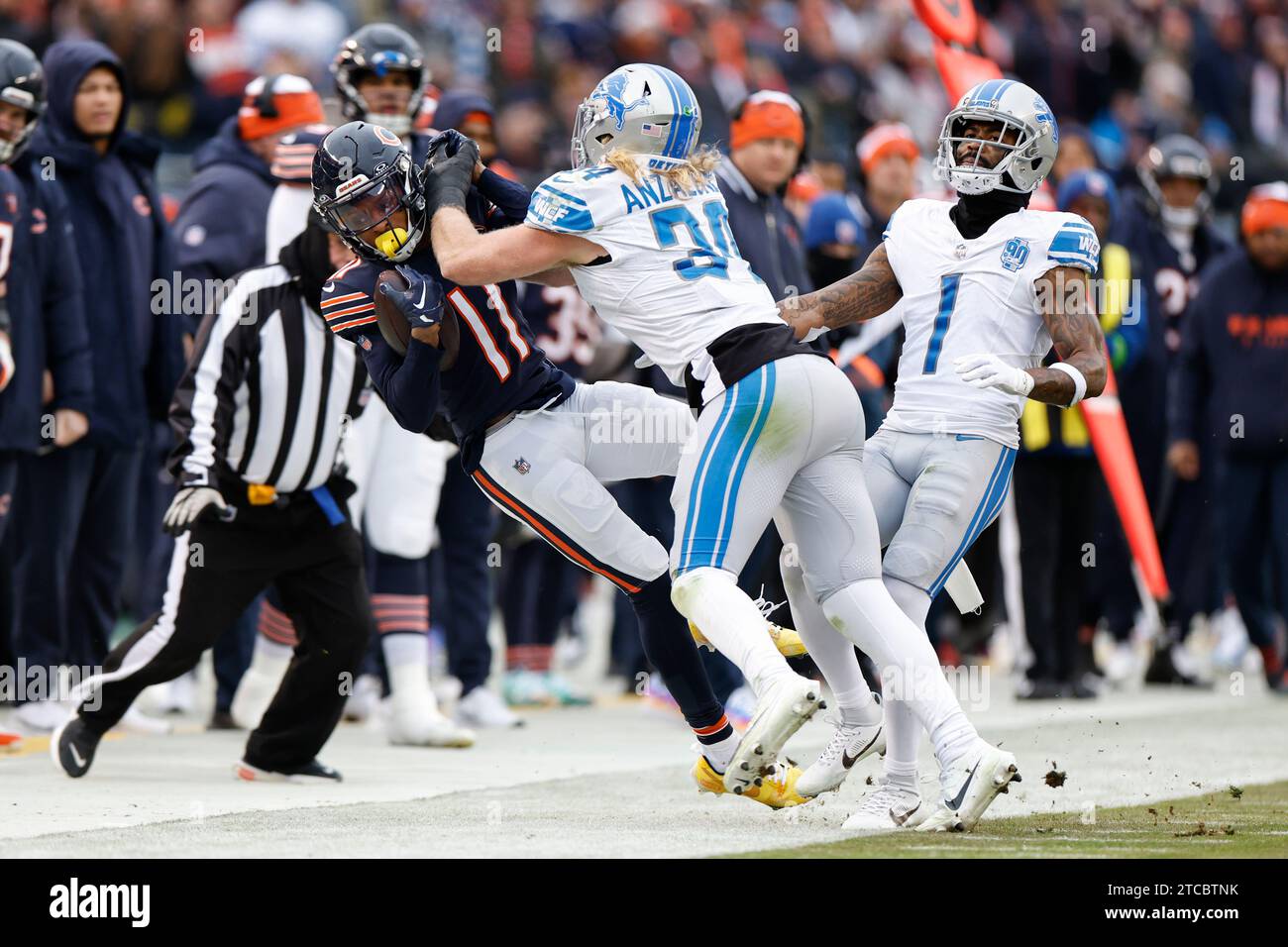 Chicago Bears wide receiver Darnell Mooney (11) is pushed by Detroit ...
