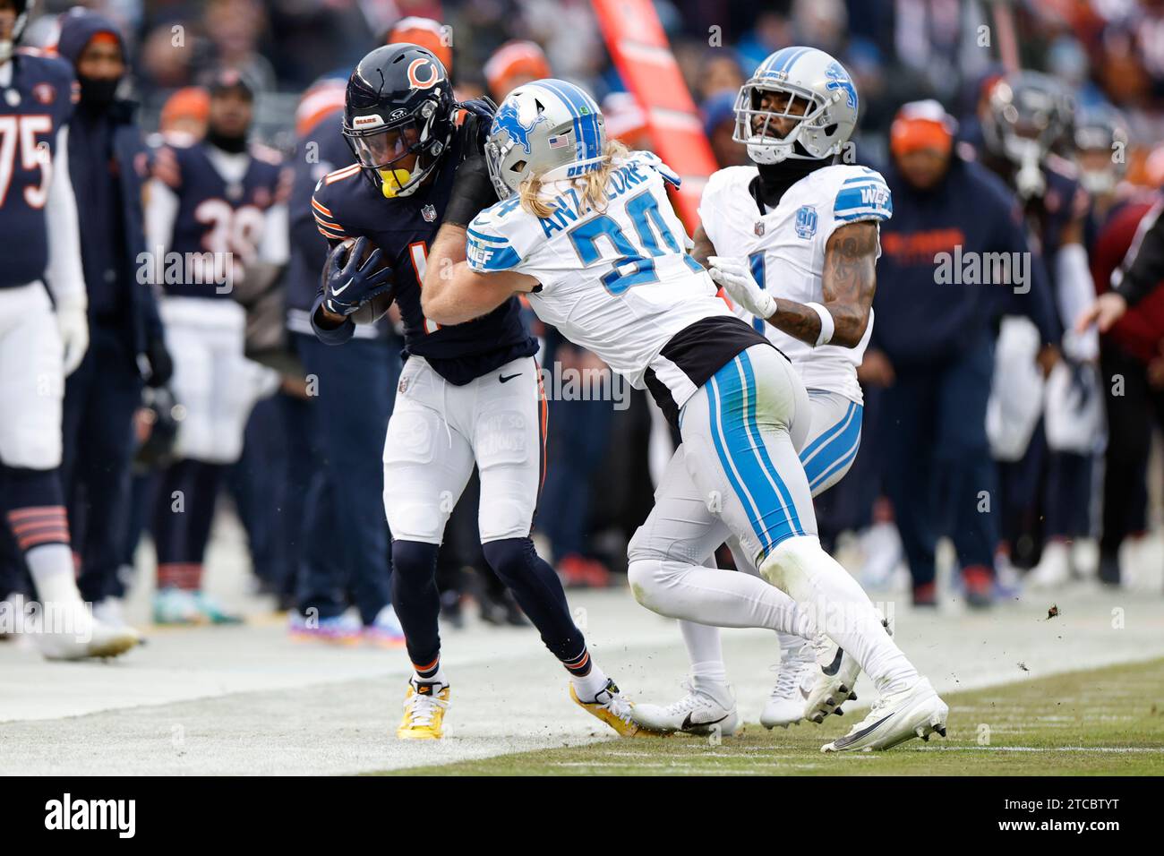 Chicago Bears wide receiver Darnell Mooney (11) is pushed by Detroit ...