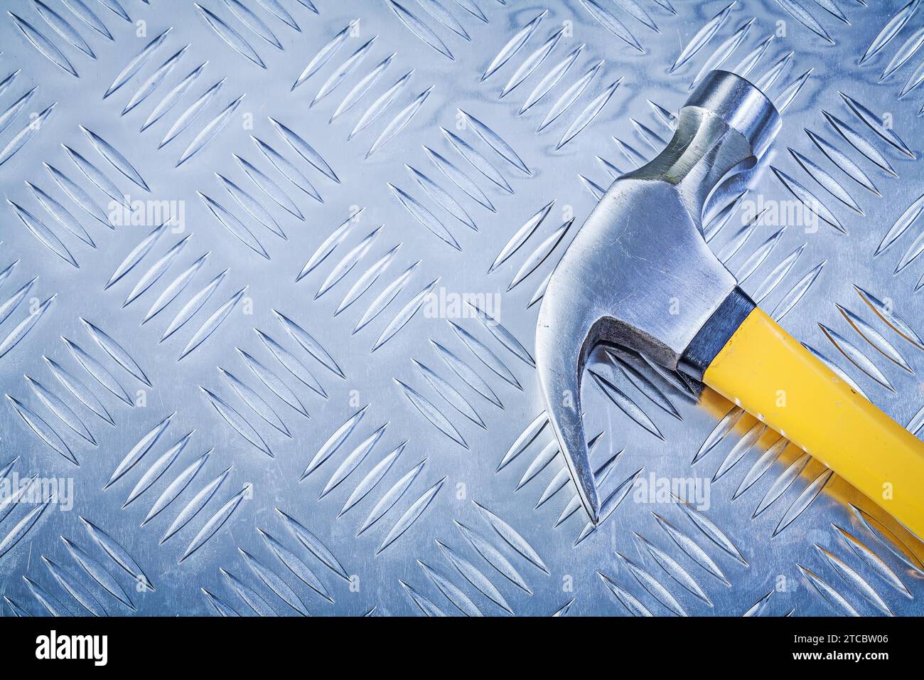 Claw hammer on fluted metal texture Construction concept Stock Photo ...
